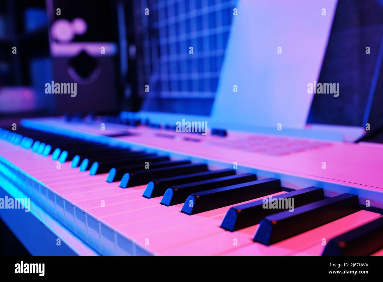 Horizontal no people close-up of modern digital synthesizer in ...