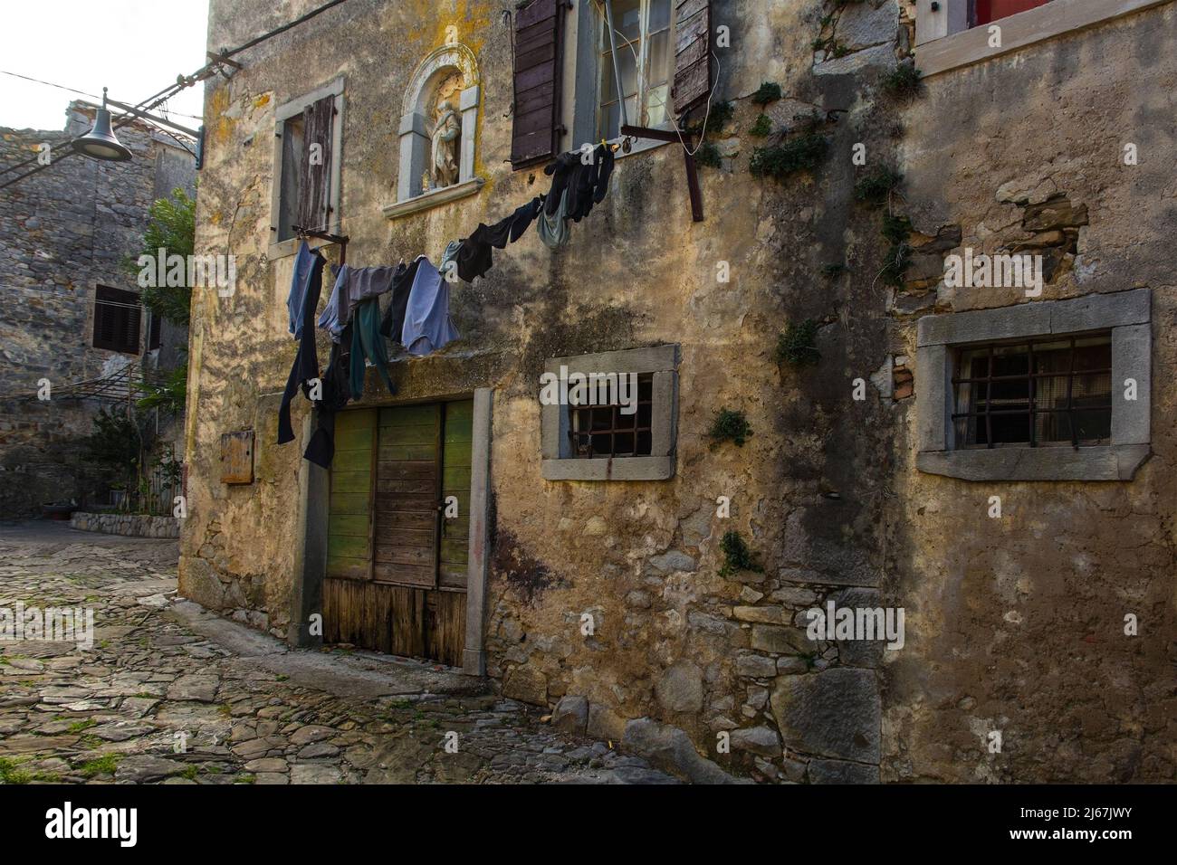 An old residential building in the historic medieval hill village of ...