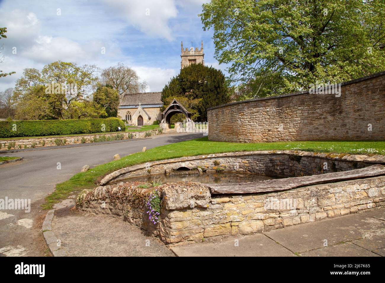 View of Overbury village horse pond and the Church of St Faith ,in ...