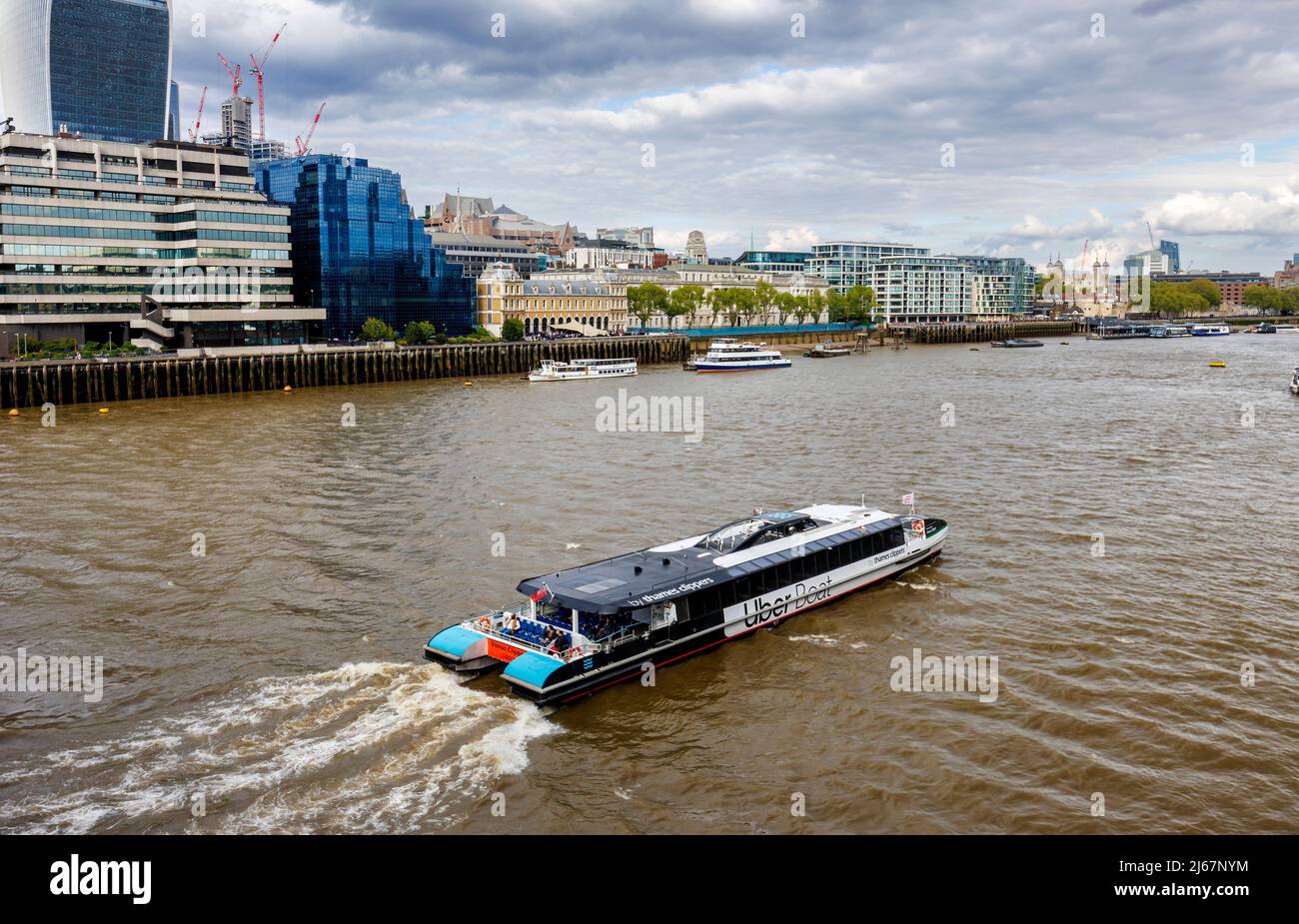 Thames Clippers Uber Boat Venus Clipper sails in the Pool of London on ...