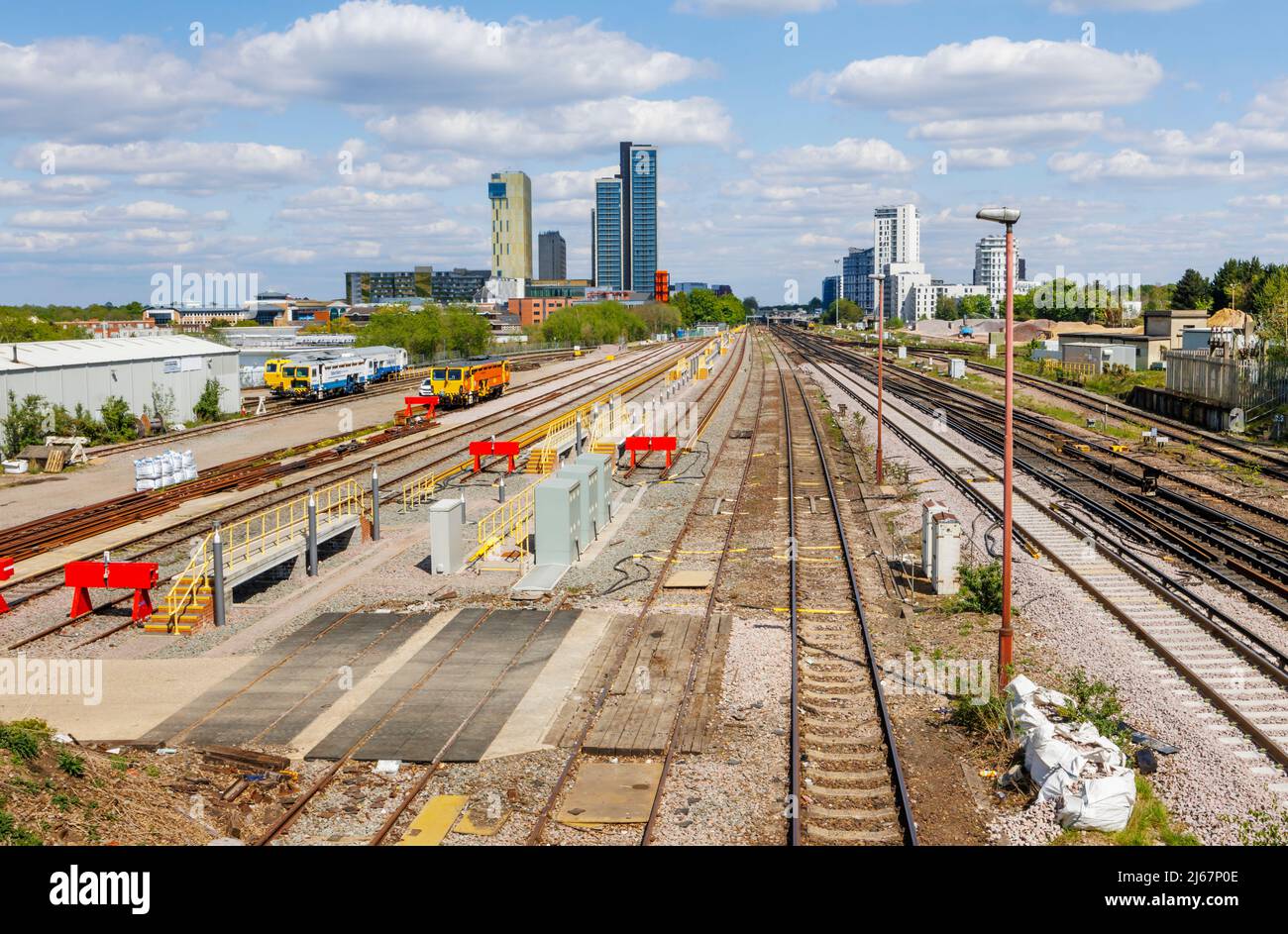 View along railway lines to the new skyscraper tower blocks of the ...