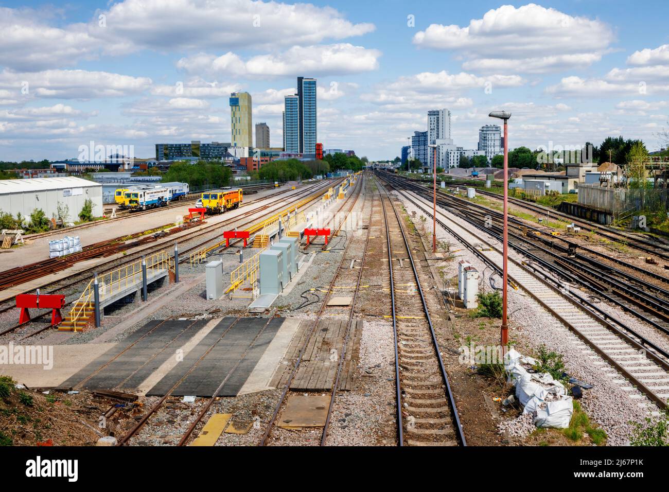 View along railway lines to the new skyscraper tower blocks of the ...