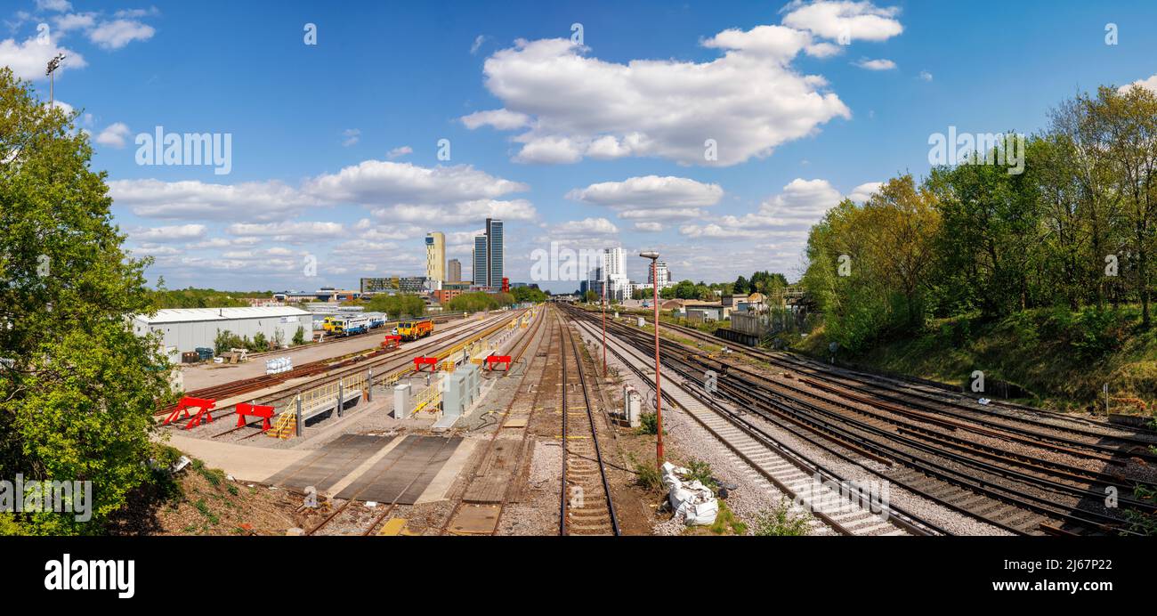 View along railway lines to the new skyscraper tower blocks of the ...