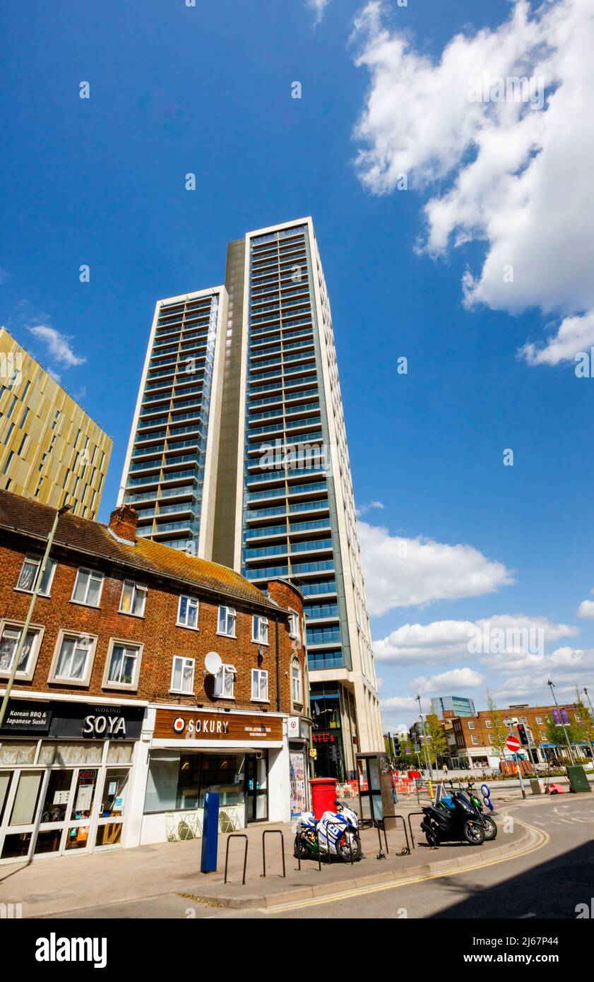 View along Goldsworth Road towards the town centre with the towers of ...