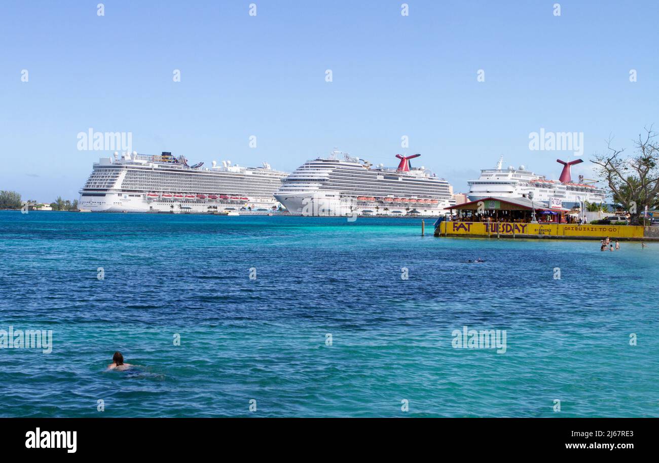 Tourists Swim And Play In The Beautiful Turquoise Waters Of Nassau Harbour The Bahamas With