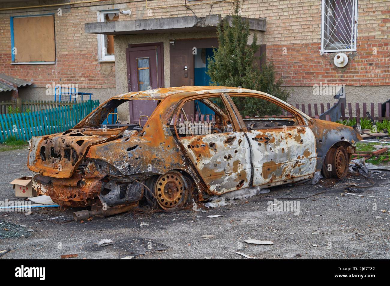2022 Russian invasion of Ukraine war torn city destroyed car burn out ...