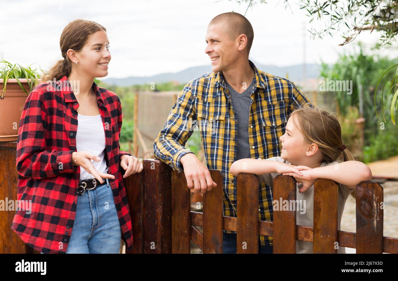 Getting to know the neighbors at country houses in village Stock Photo ...