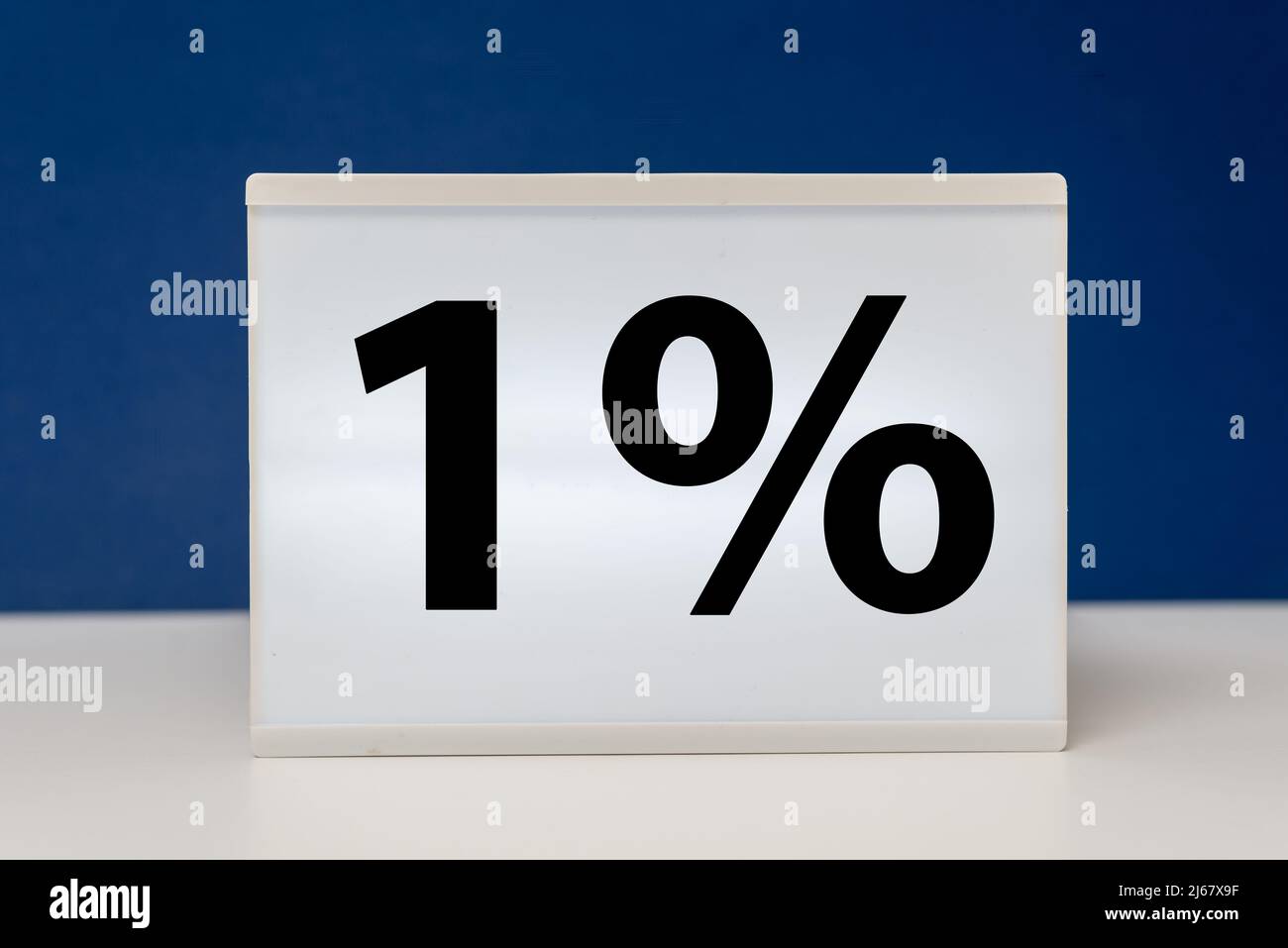 One percent sign on white led box Stock Photo - Alamy