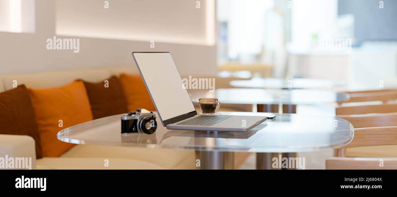 Modern cafeteria interior design with comfy colourful sofa, laptop ...