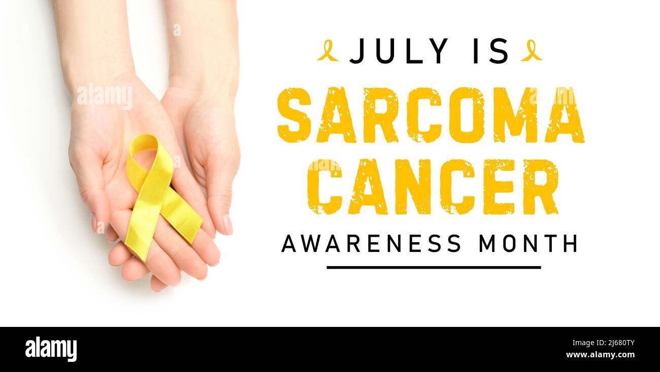 Hands with yellow ribbon and text JULY IS SARCOMA CANCER AWARENESS ...