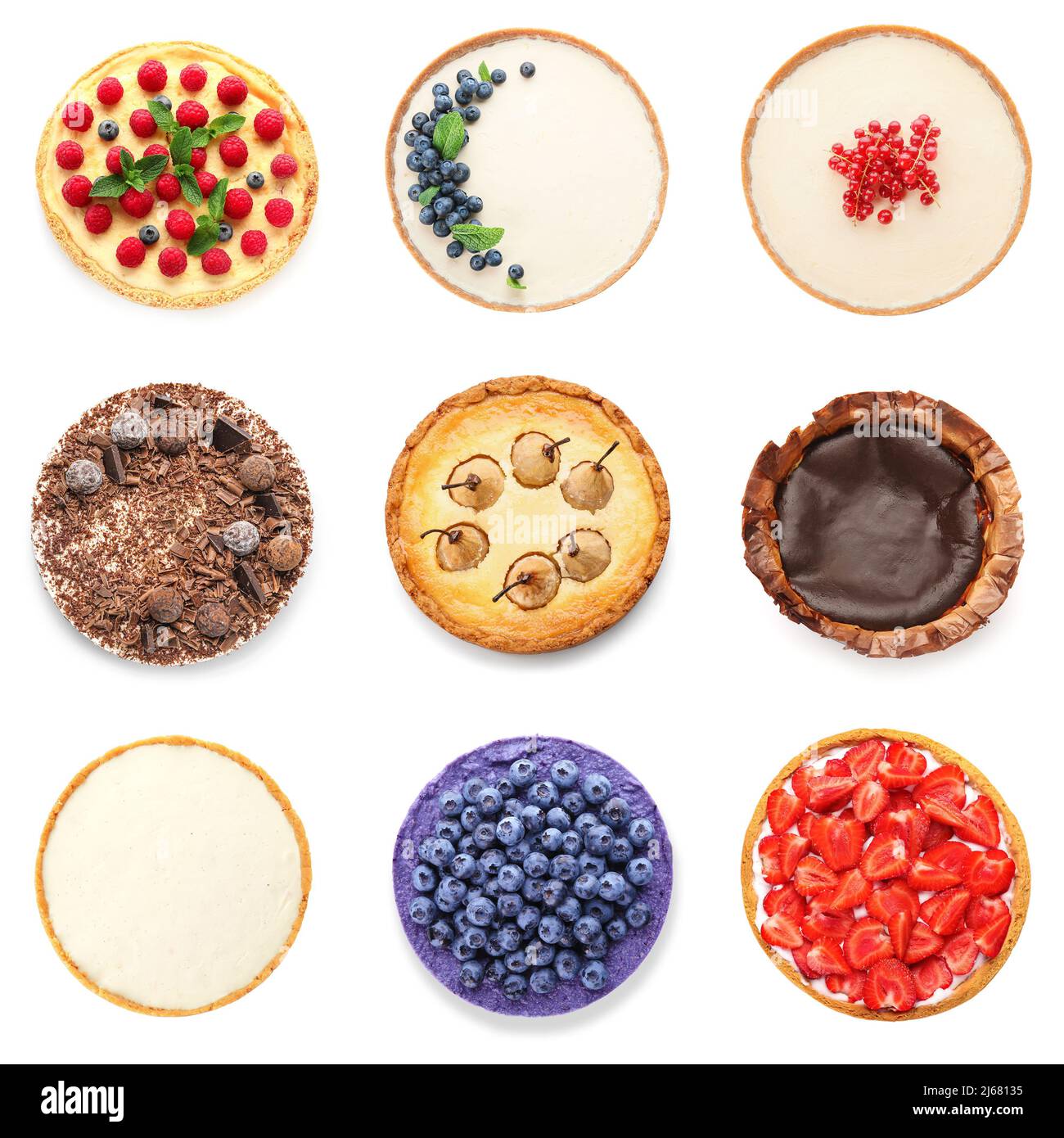 Set of delicious cheesecakes on white background, top view Stock Photo ...