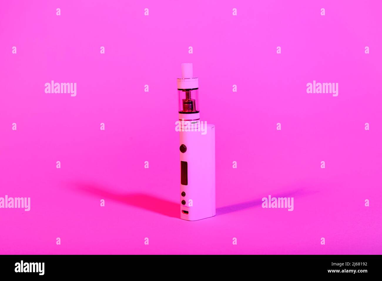 Modern vape mod on color background Stock Photo - Alamy