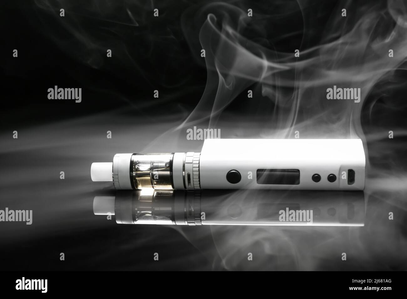 Modern vape mod and smoke on black background Stock Photo - Alamy