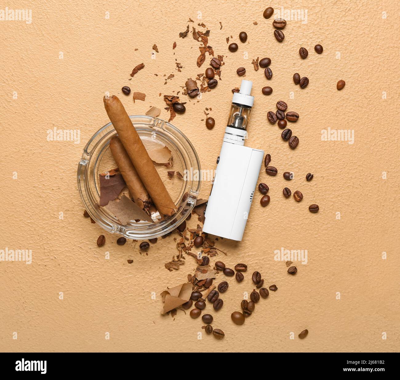 Modern vape mod, cigars and coffee beans on beige background Stock ...