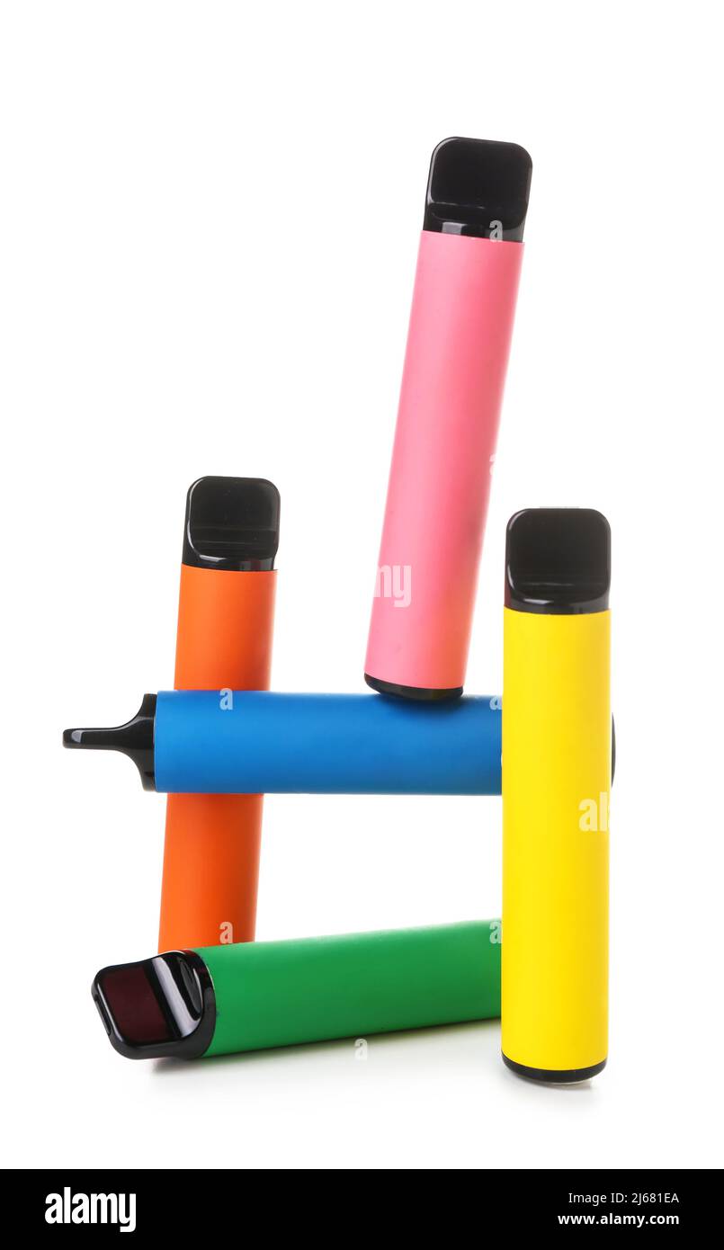 Different disposable electronic cigarettes on white background Stock ...