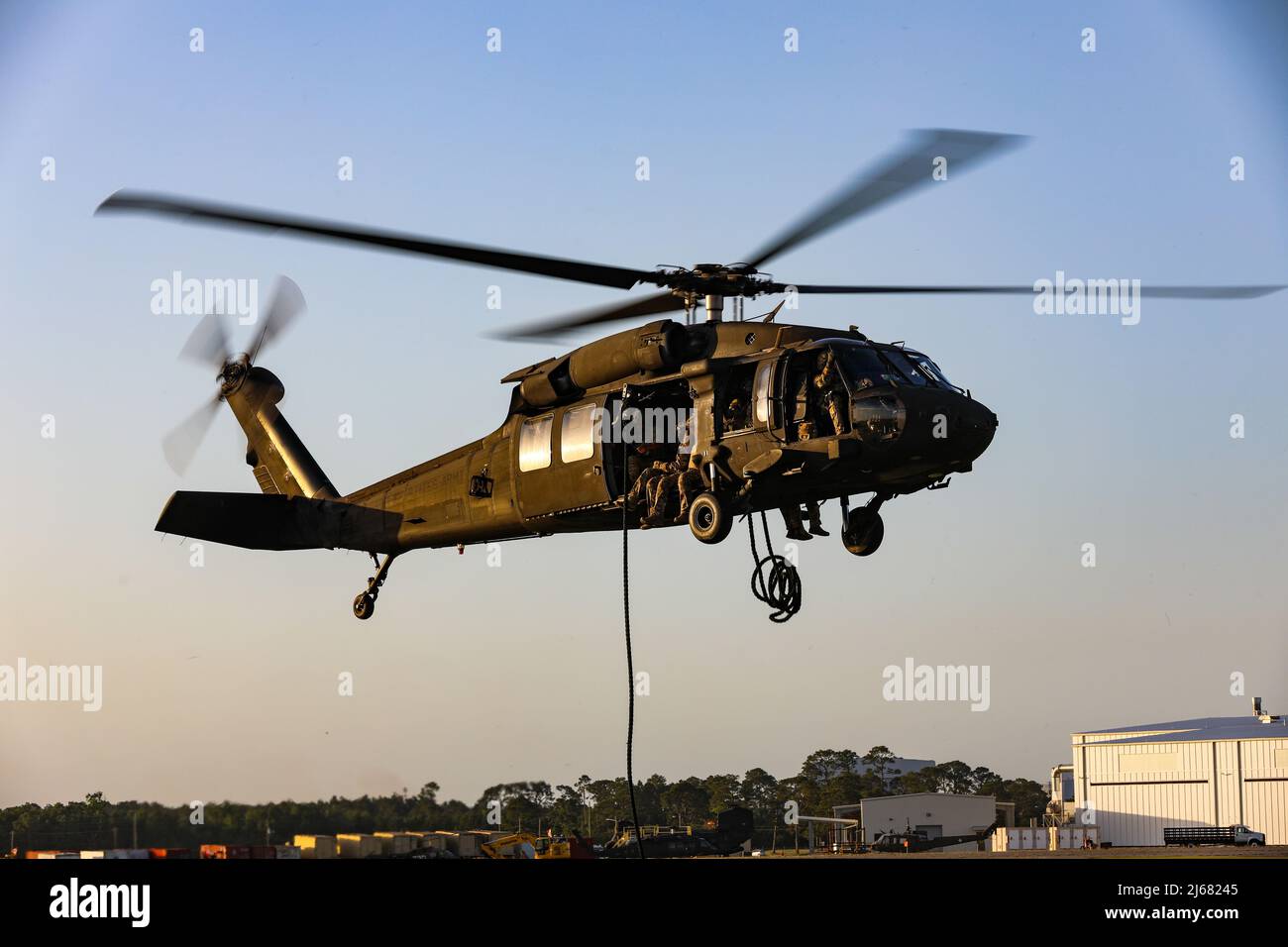 U.S. special operations service members participate in Fast Rope ...