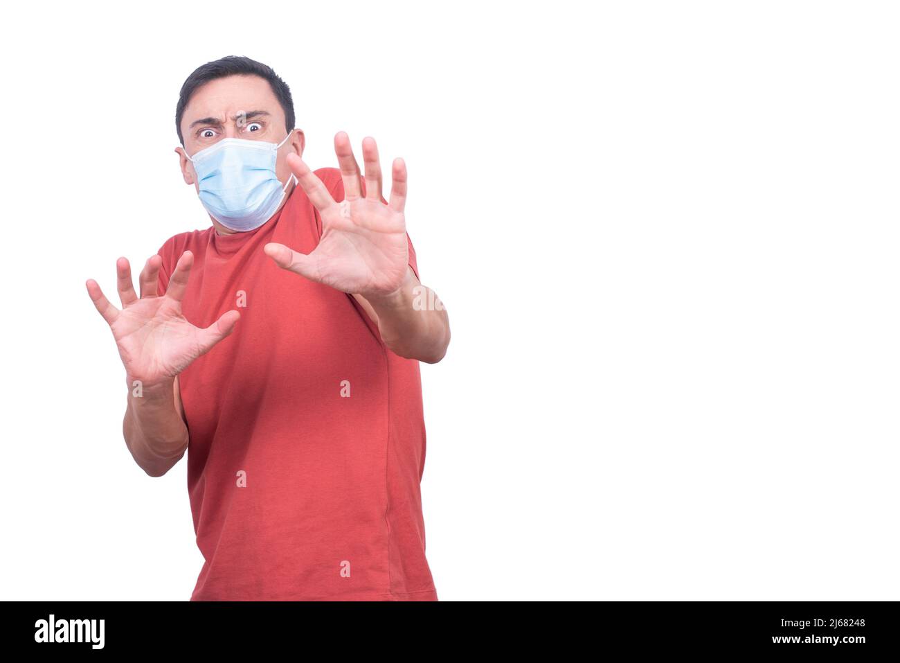 Scared man in medical mask hi-res stock photography and images - Alamy