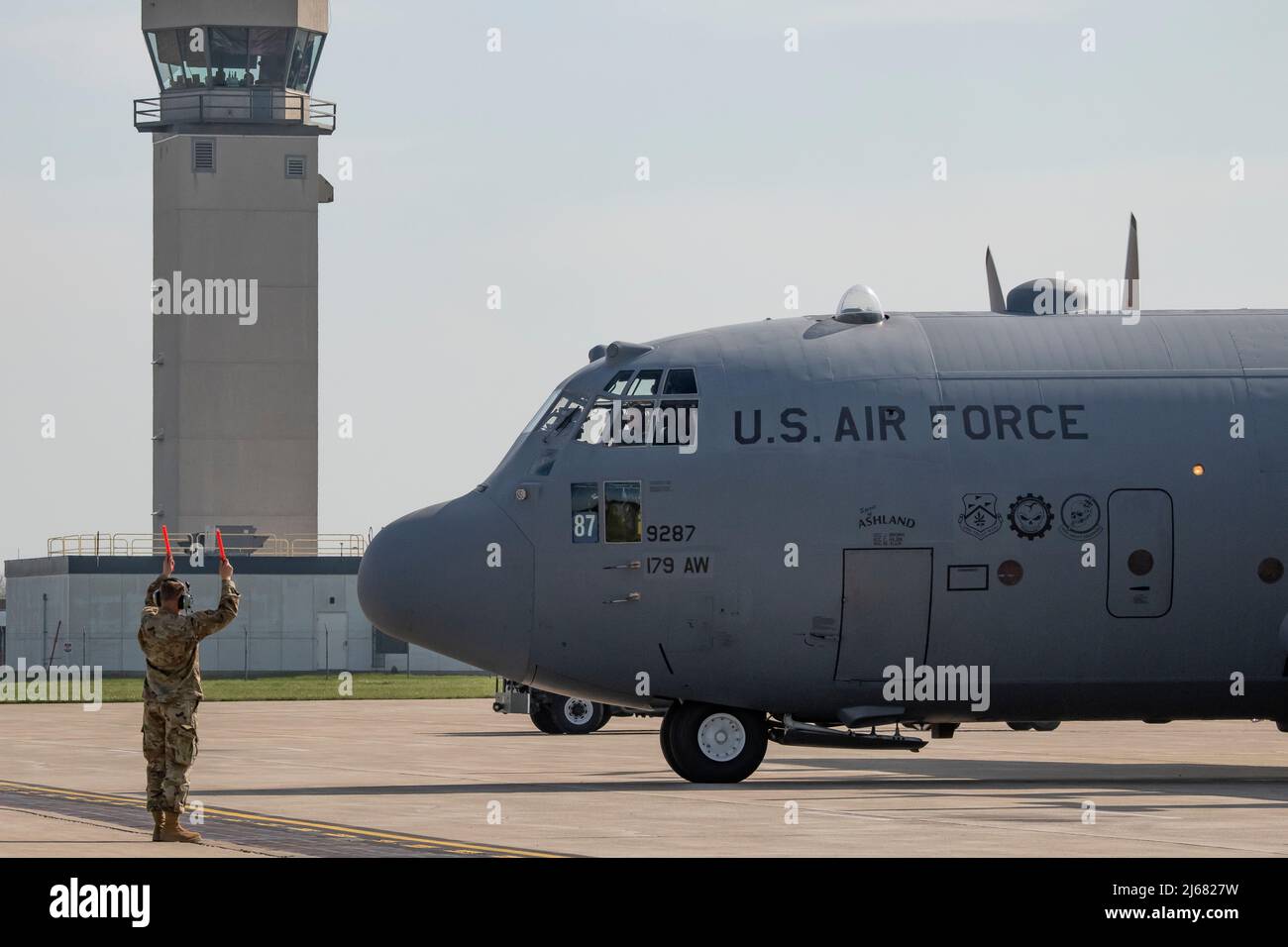 164th Airlift Squadron members conduct the ceremonial final formation ...