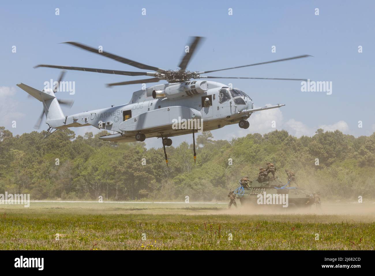 U.S. Marines with Combat Logistics Battalion (CLB) 24 attach a Light ...