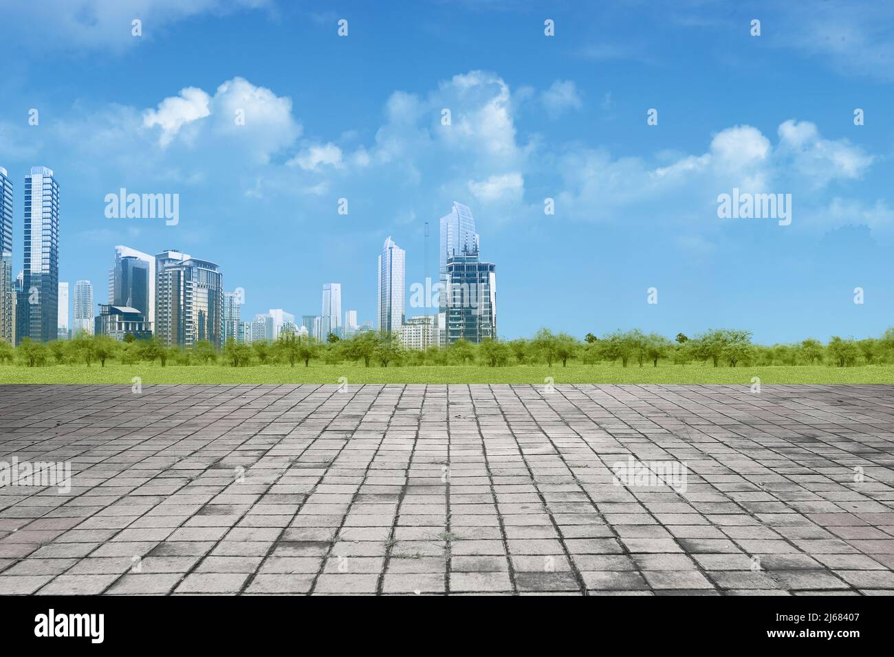 Pathway with meadow field and cityscapes view with a blue sky ...