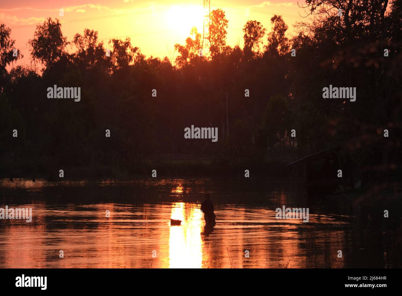 Solar reflection in small lake hi-res stock photography and images - Alamy