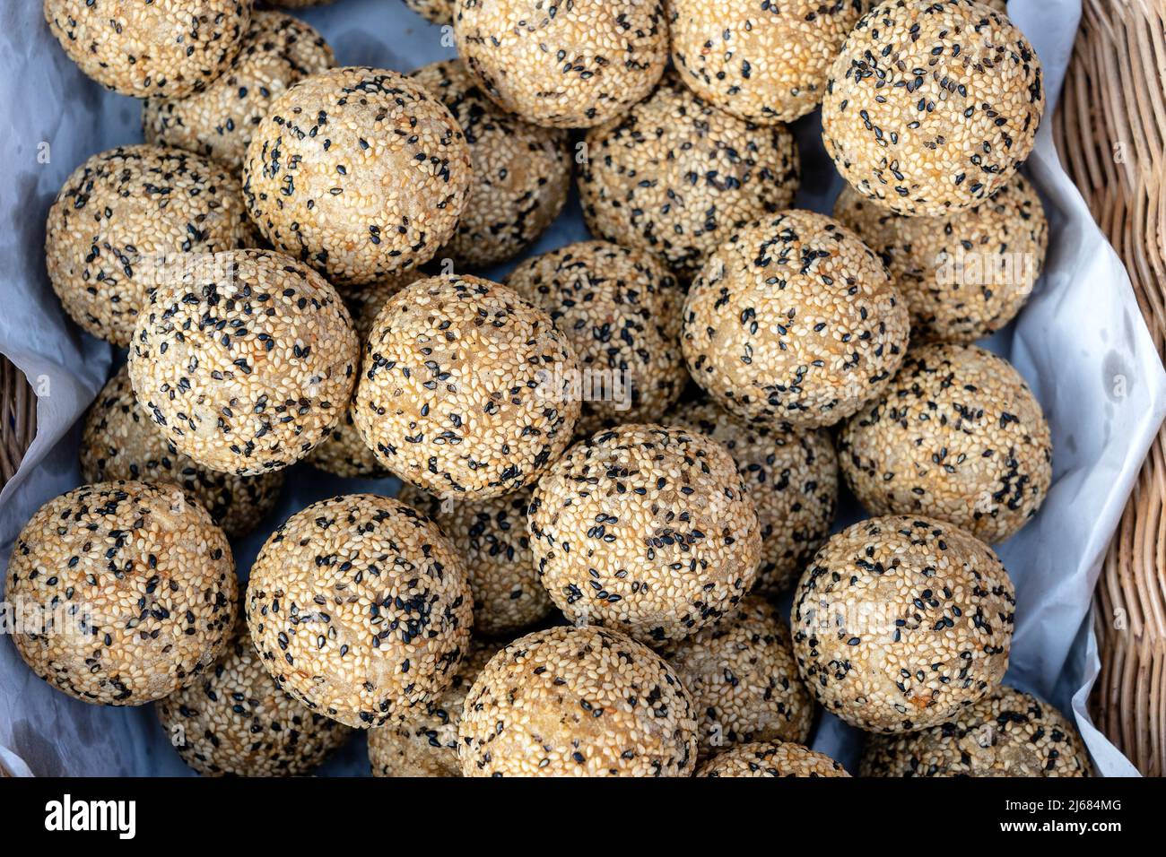 Coconut rice balls with sesame seeds is traditional Thai dessert made ...