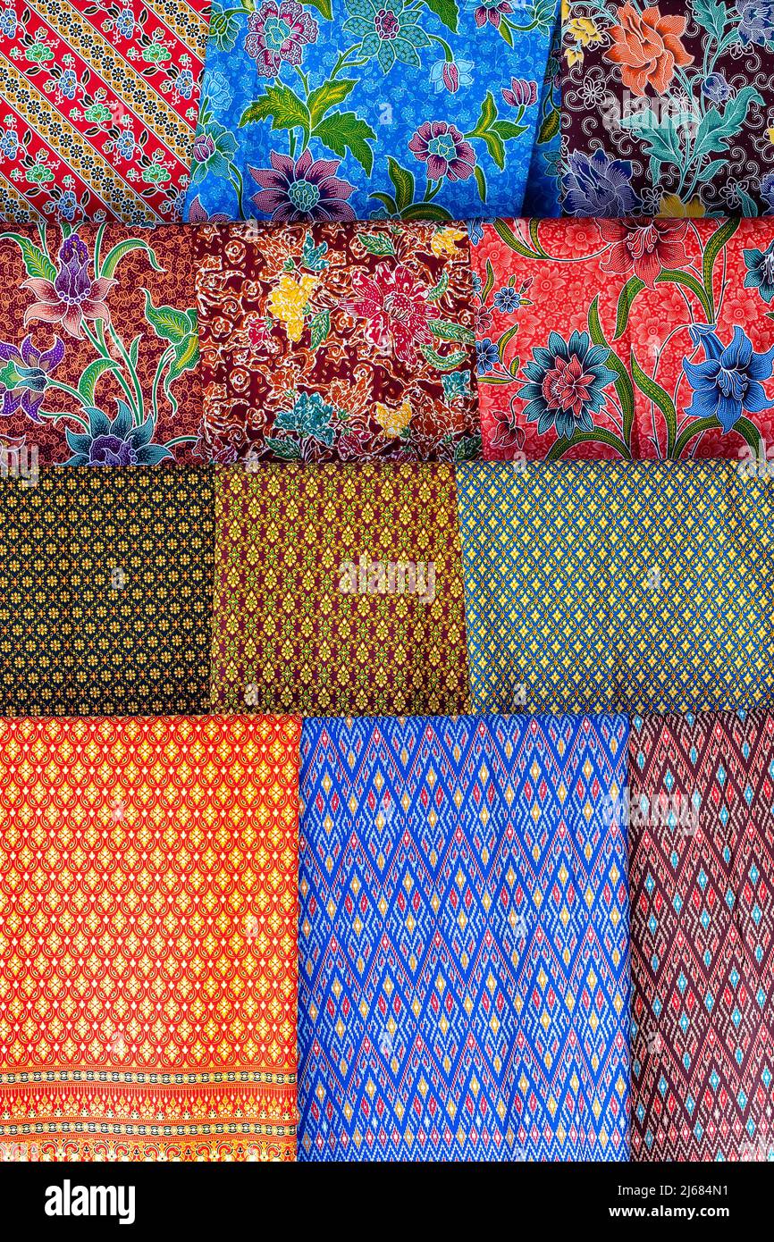 Colorful traditional sarongs for sale on street market in Thailand ...