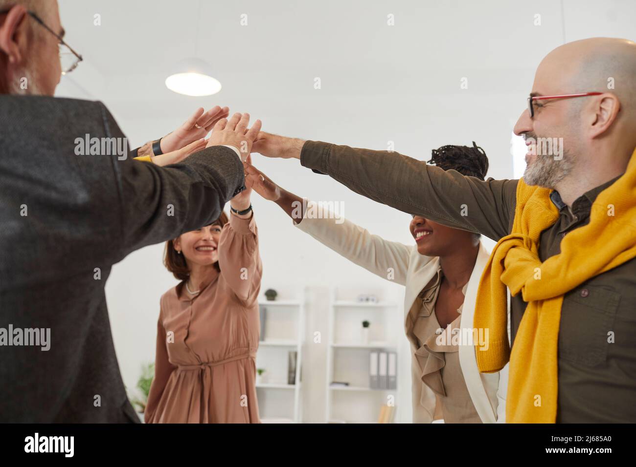 African american worker join together hi-res stock photography and ...