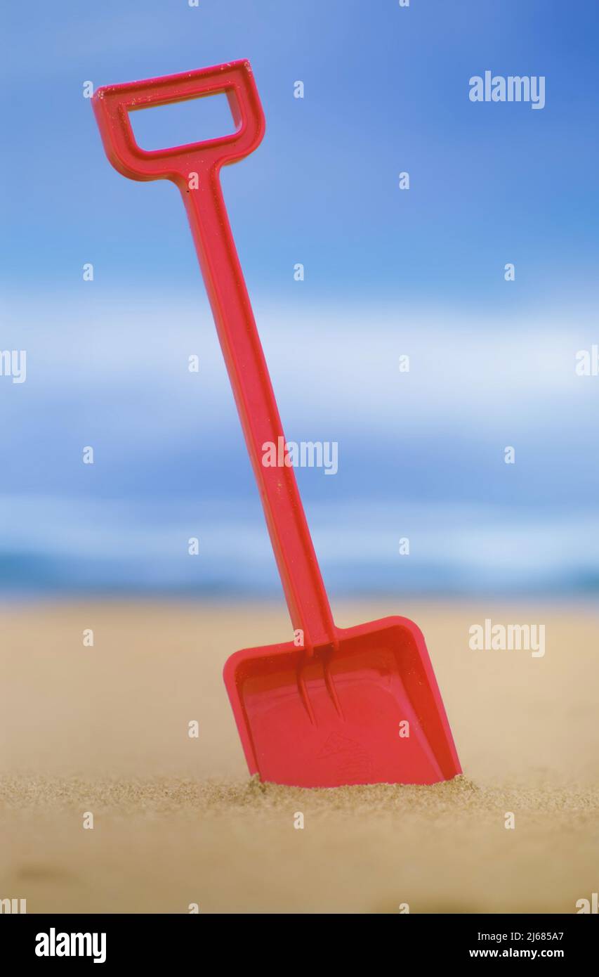 Toy shovel on beach hi-res stock photography and images - Alamy