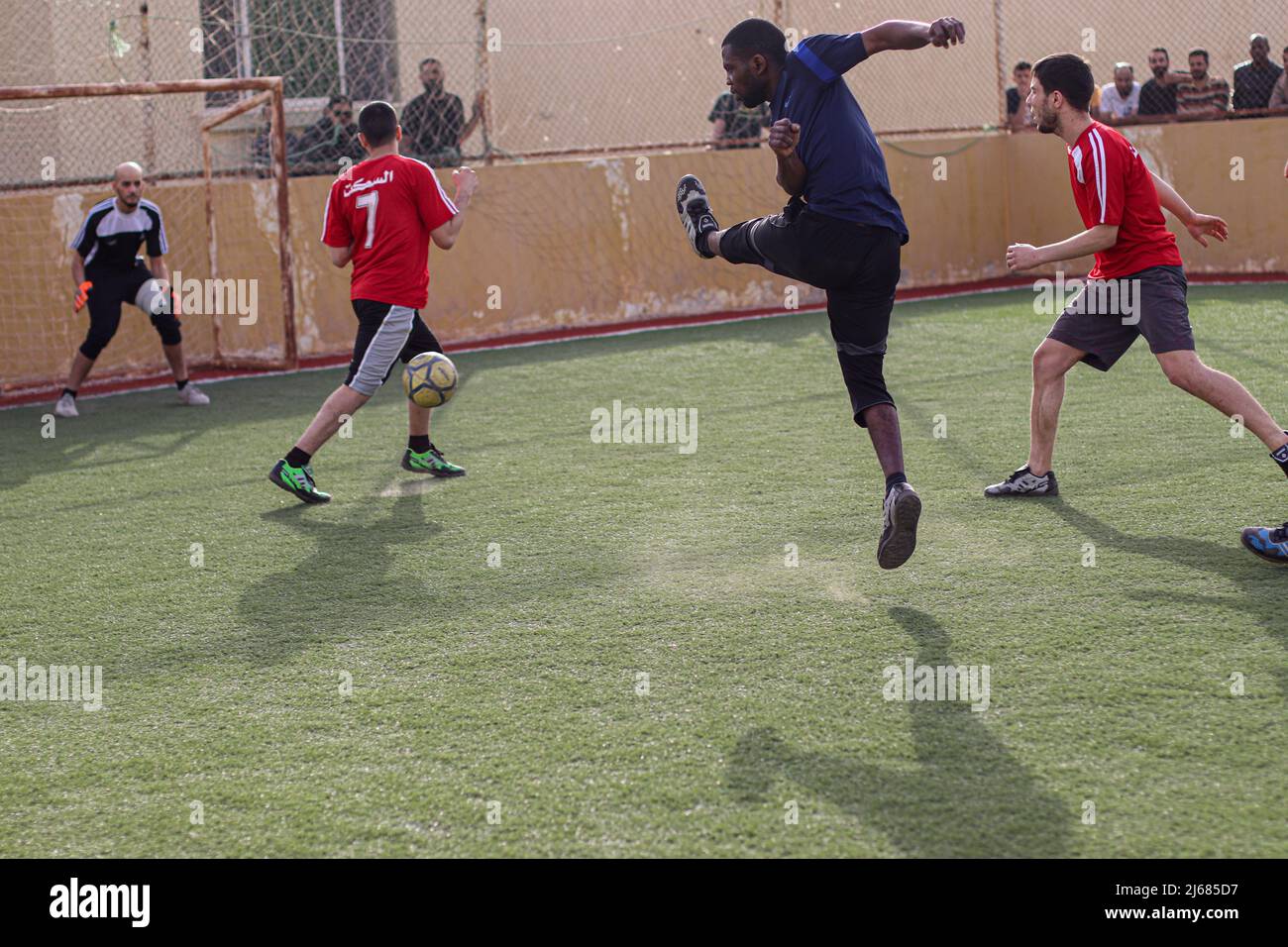 The Nigerian inmate is trying to kick a goal in prison Al-Sakt in the ...