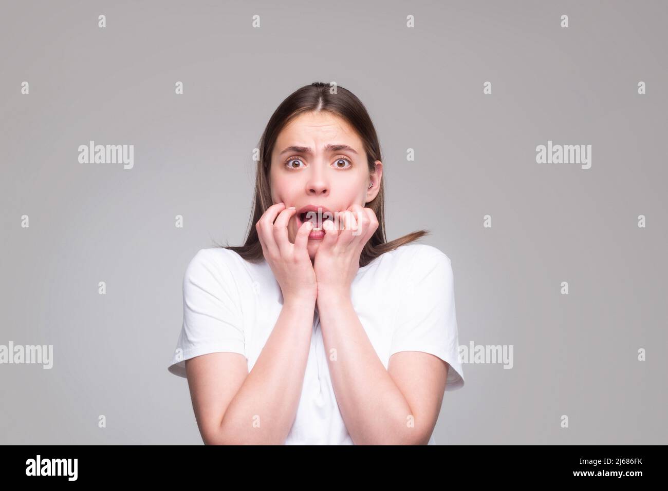 Shocked face of surprised young woman. Funny female shocked face ...