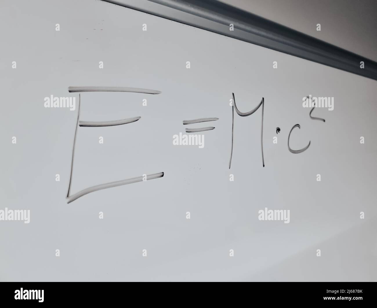 mathematical symbols of an equation from a mathematics lecture on a ...