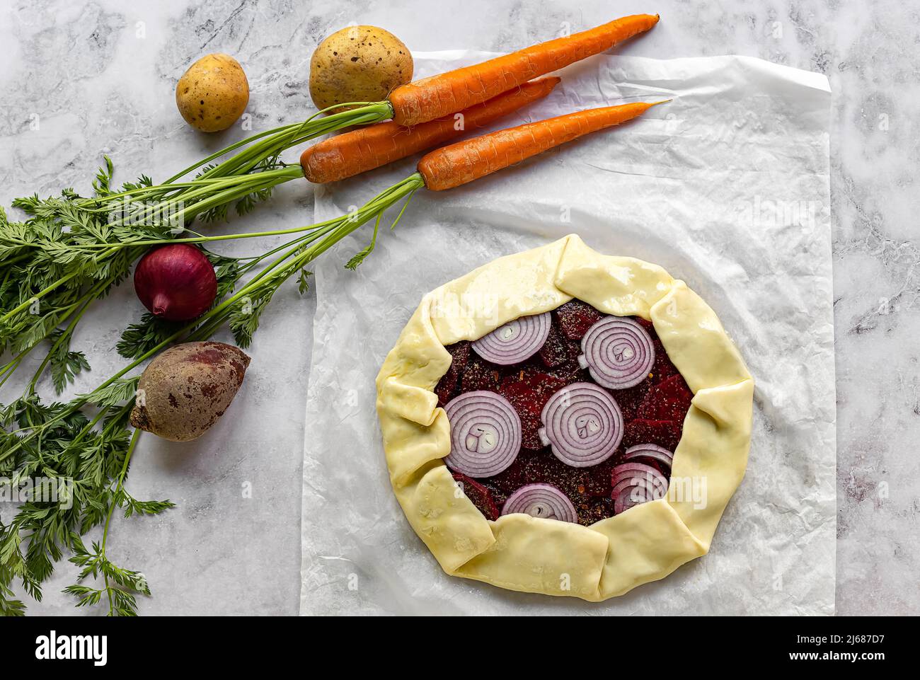 Step by step recipe of savory root vegetable galette. Step 6 Stock ...