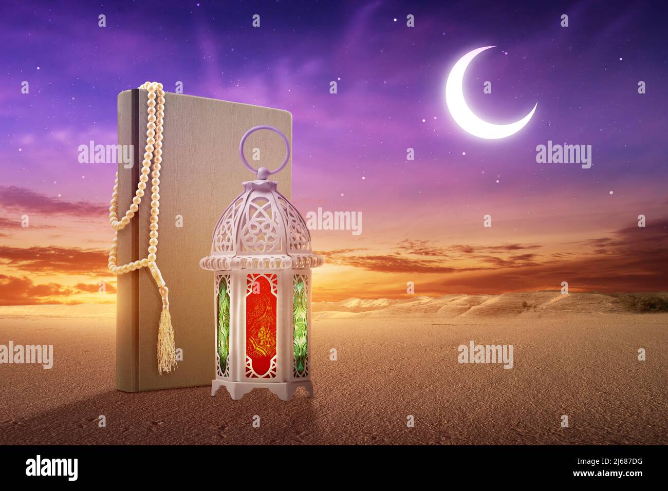 Quran with prayer beads and Arabic lamp with beautiful light with the ...