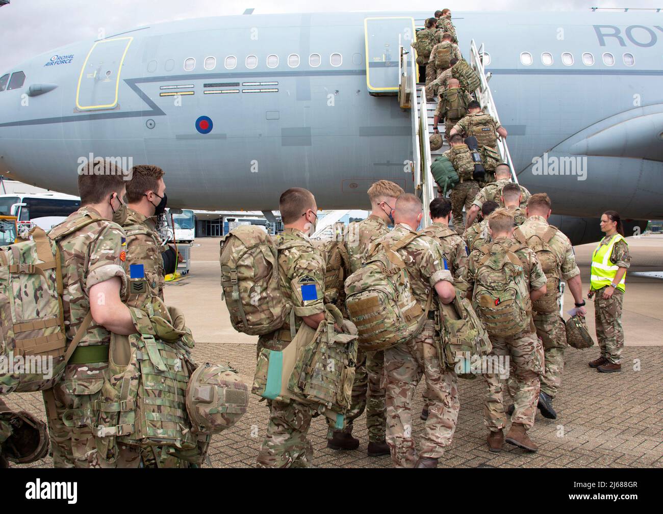 Undated handout photo issued by Ministry of Defence (MoD) of UK military personnel boarding an ...