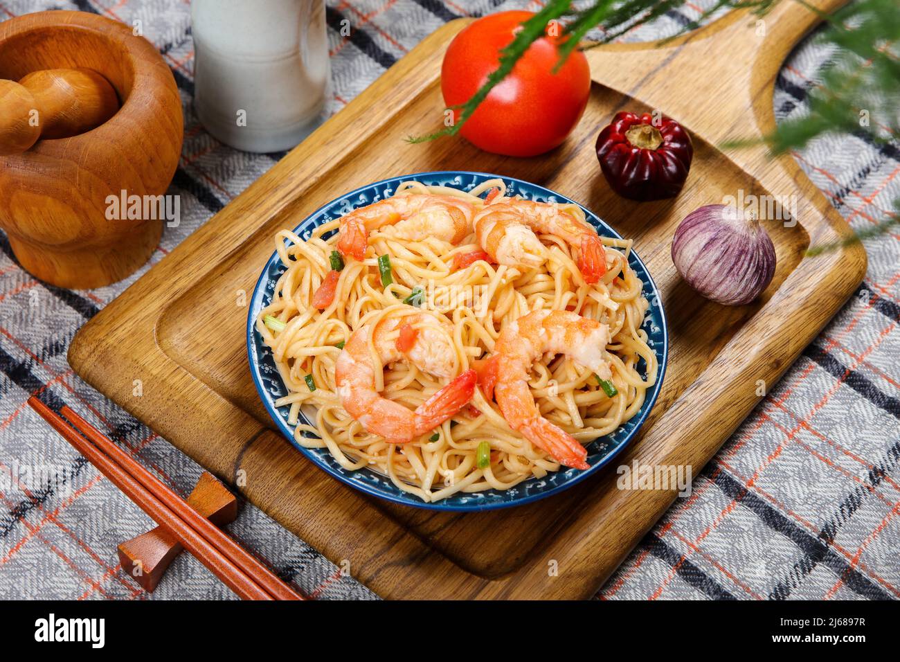 A bowl of pasta in tomato juice Stock Photo - Alamy