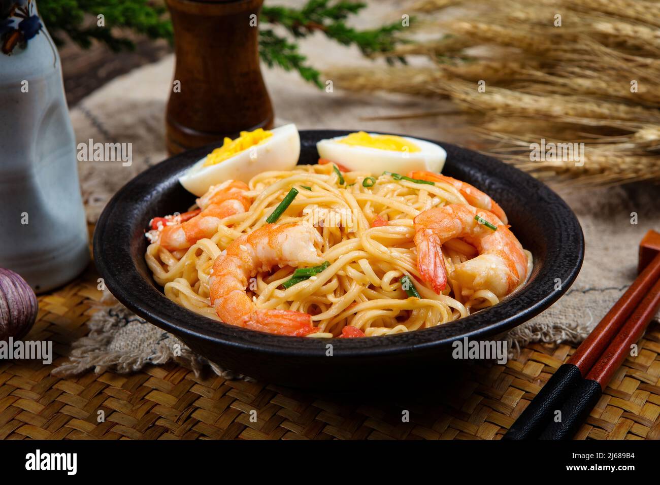 A bowl of pasta in tomato juice Stock Photo - Alamy