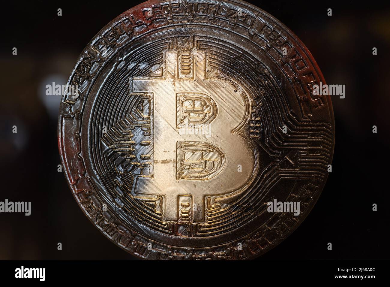 Bitcoin Symbol on a Round Golden Emblem Surrounded by Zeroes and Ones ...