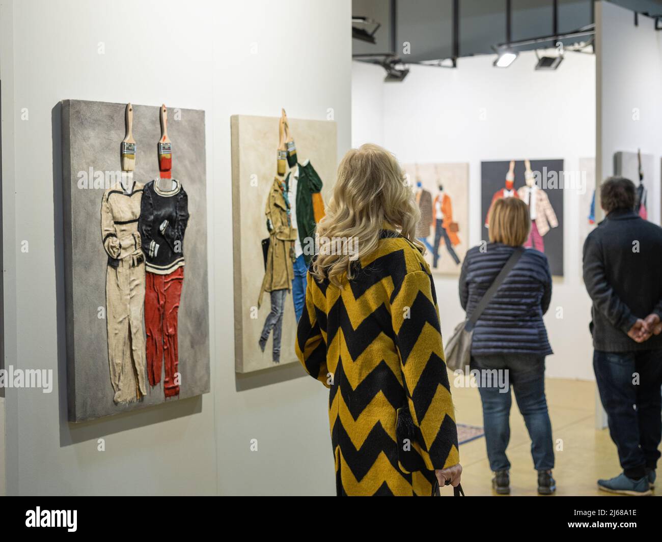 People Admiring Paintings in a Modern Art Gallery Stock Photo - Alamy