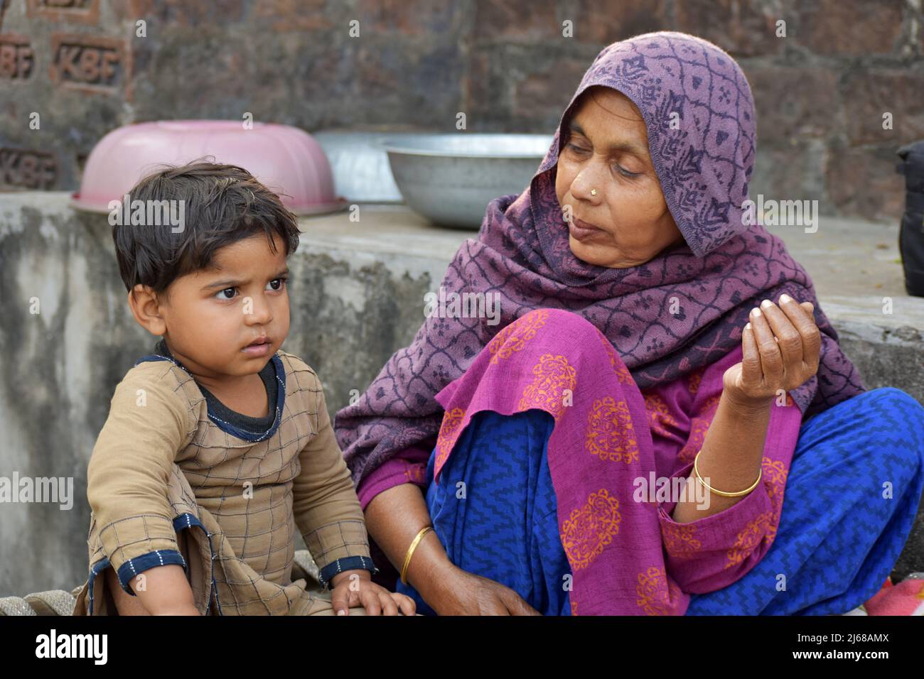 INDIA, UTTAR PRADESH, BARABANKI VILLAGE, December 2021, Grandmother and ...