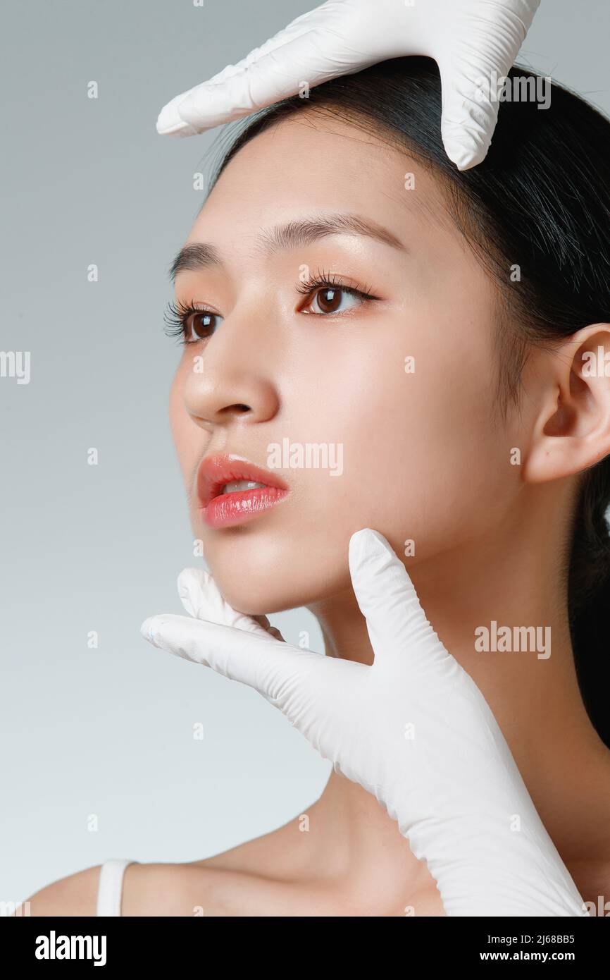 Young women to have plastic surgery Stock Photo - Alamy