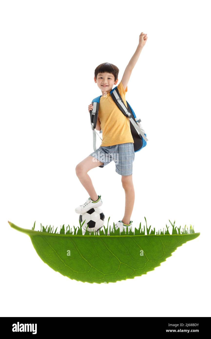 Boys playing soccer Cut Out Stock Images & Pictures - Alamy