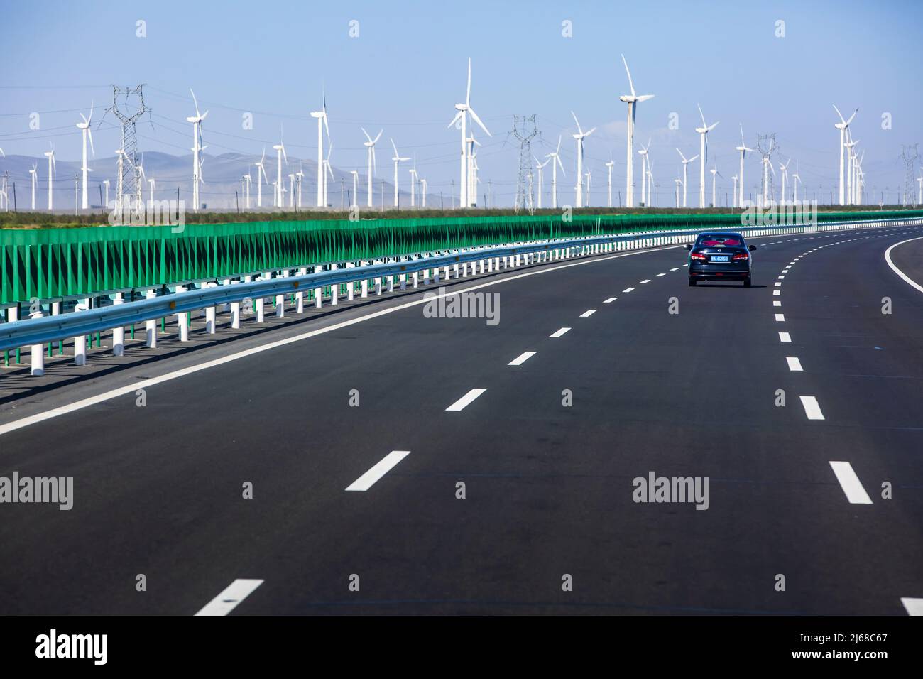 The windmill with highway Stock Photo - Alamy