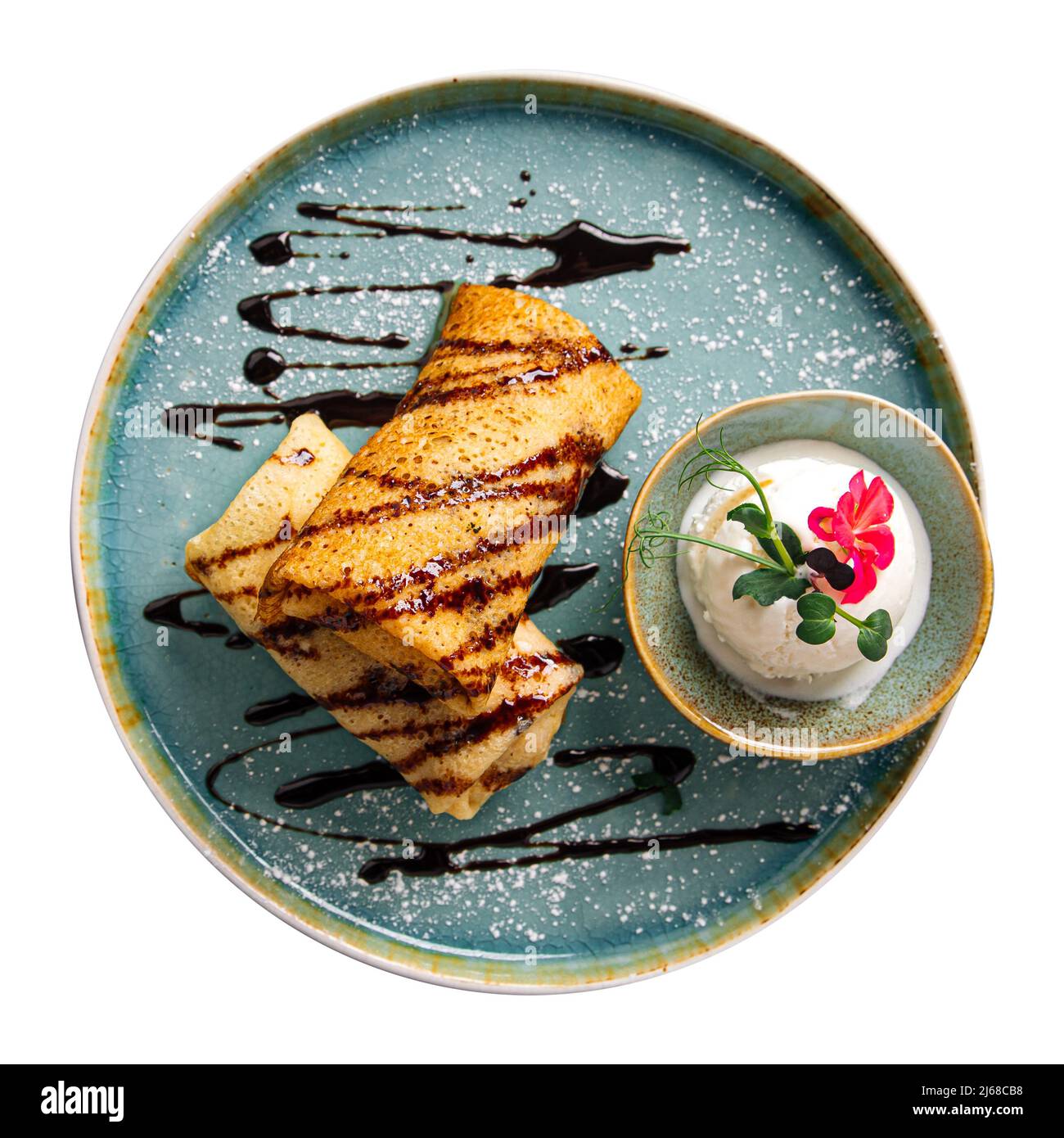 Isolated portion of apple stuffed pancake rolls Stock Photo - Alamy