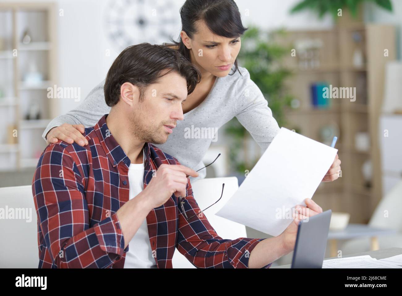 husband and wife doing paperwork together Stock Photo - Alamy
