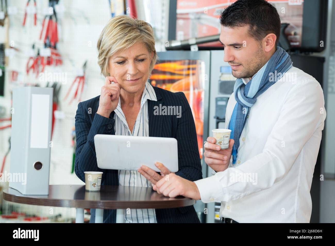 talking about work during break time Stock Photo - Alamy