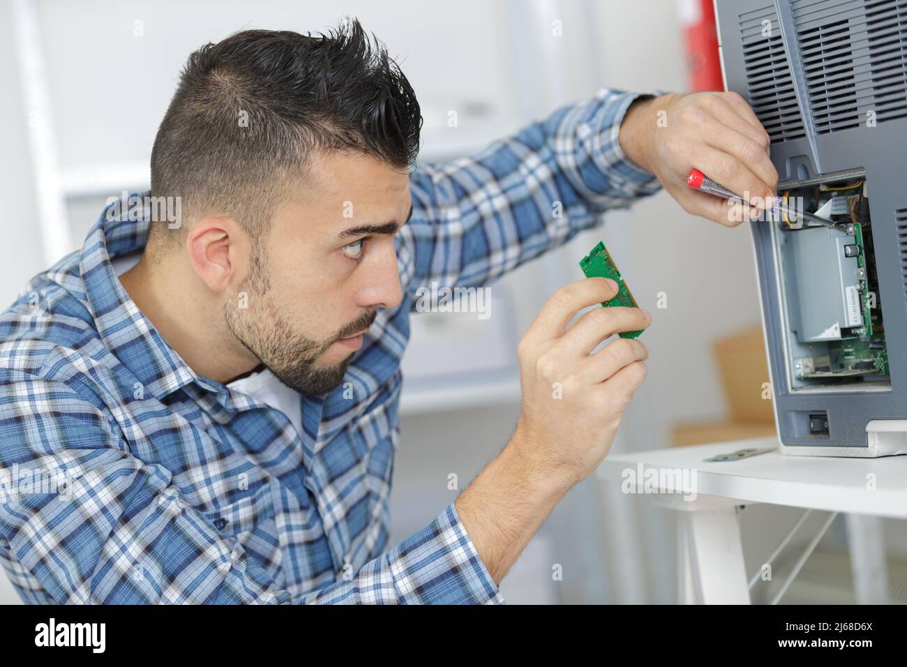 Inserting cpu hi-res stock photography and images - Alamy
