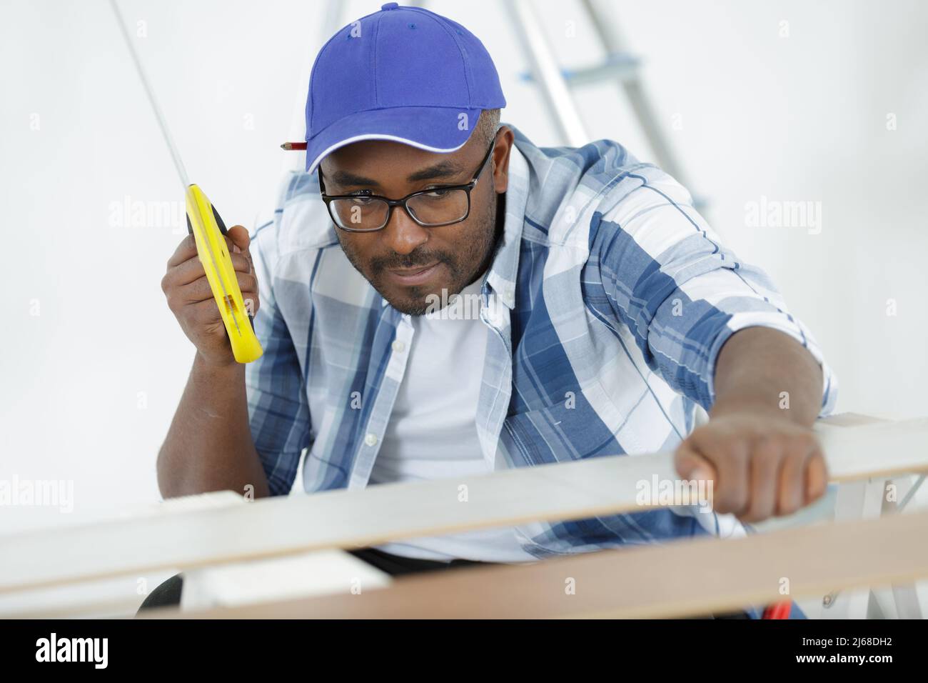Man using handsaw hi-res stock photography and images - Alamy