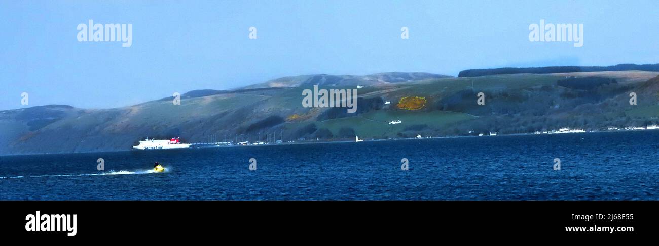 Loch Ryan, Cairnryan as viewed from Stranraer with a jet skier passing ...