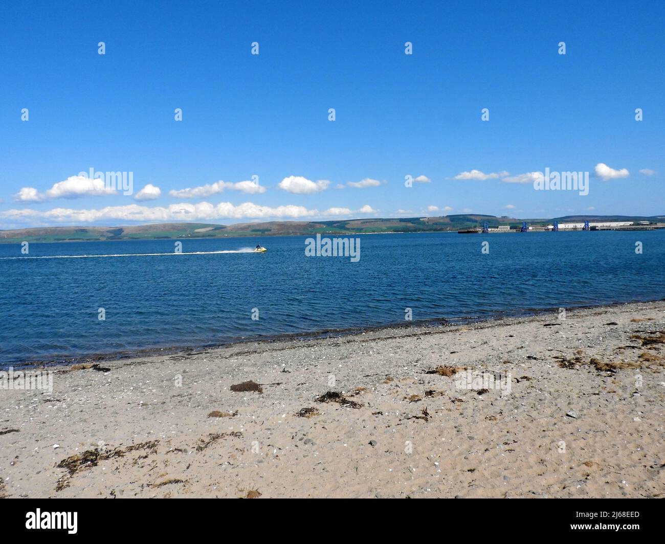 Loch Ryan, Scotland , a jets kier with Stranraer pier and railway ...